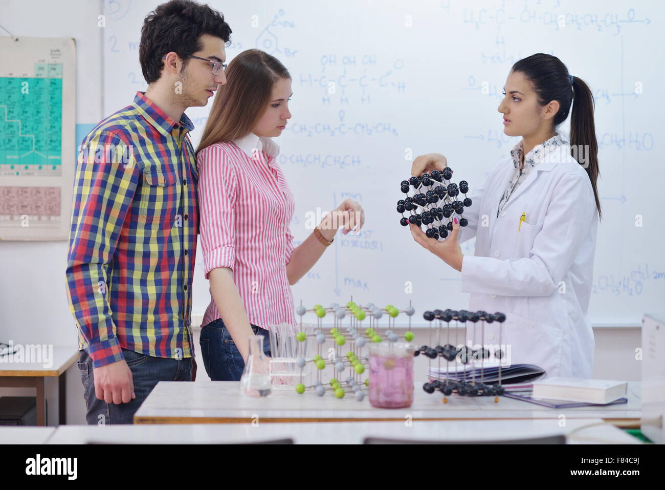 happy young teens group in school have fun an learning lessons Stock ...