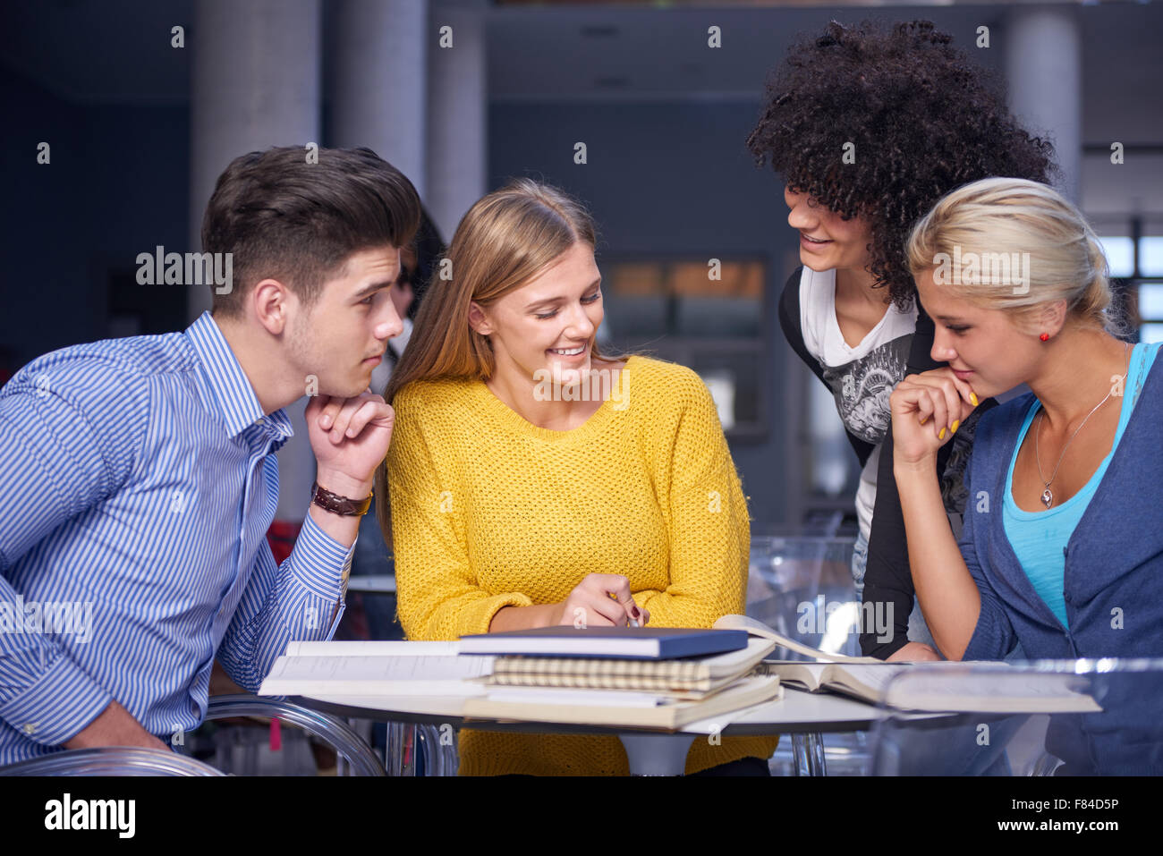 happy students group study in classroom Stock Photo - Alamy
