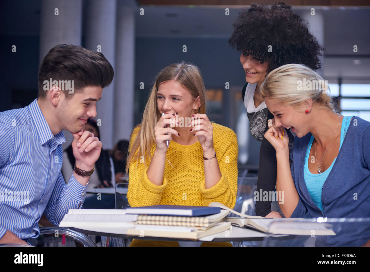 happy students group study in classroom Stock Photo - Alamy