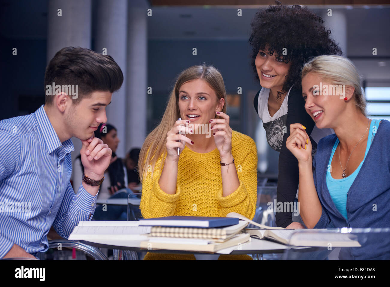 happy students group study in classroom Stock Photo - Alamy