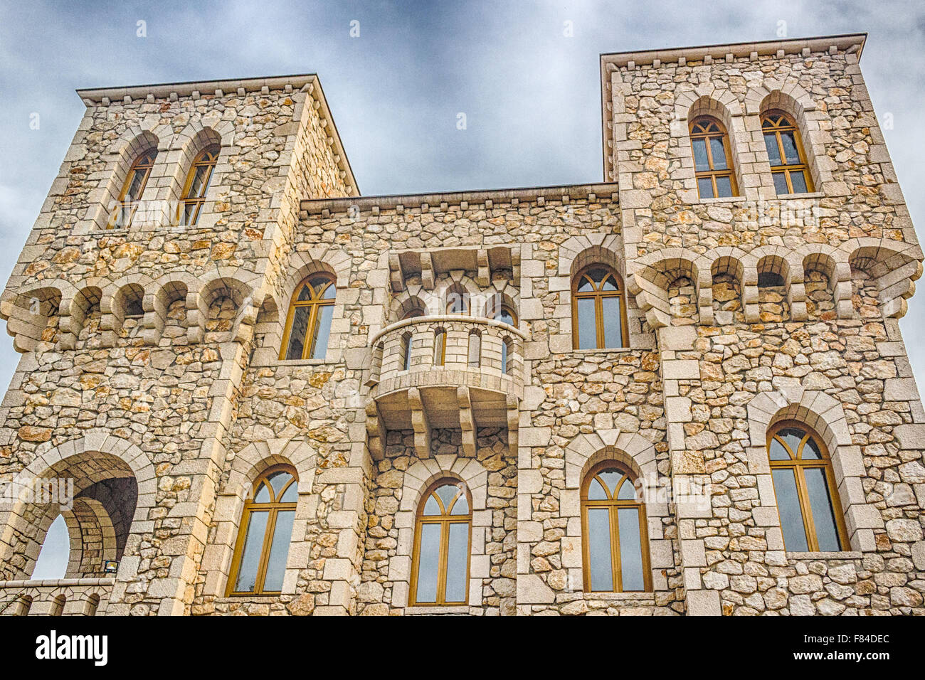 building with stone walls and willow Stock Photo - Alamy