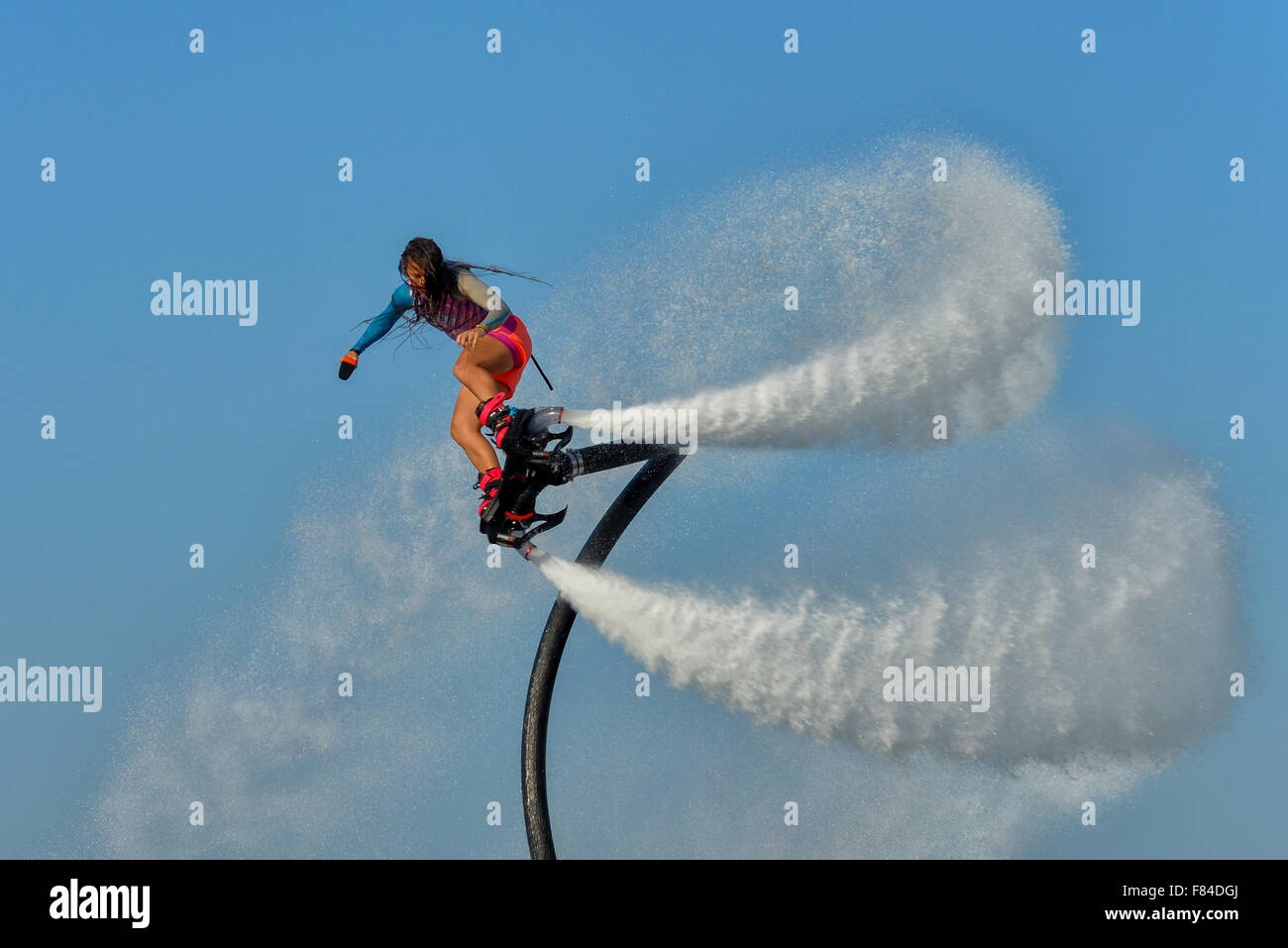 Female Flyboarder in Dubai, UAE Stock Photo - Alamy