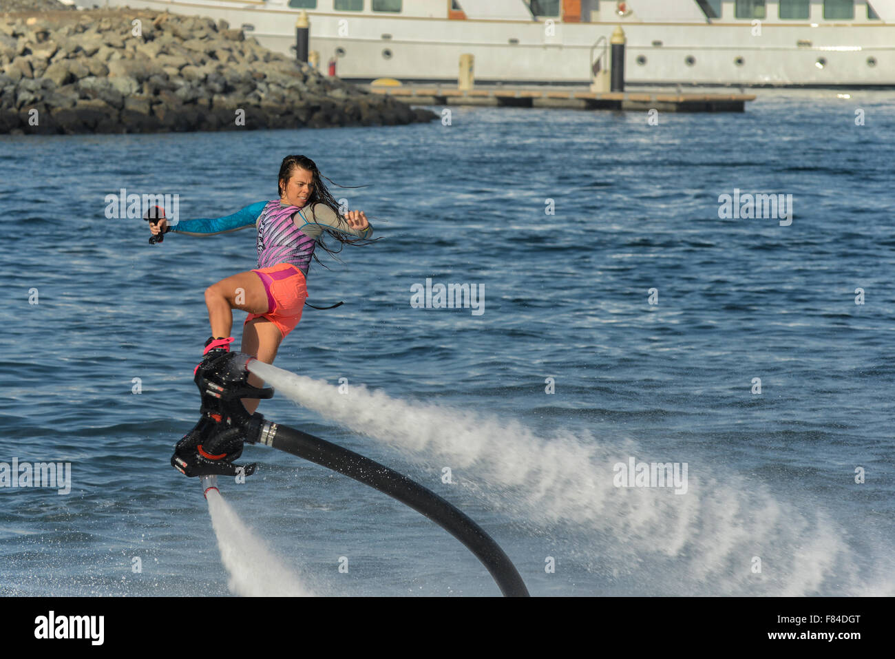 Female Flyboarder in Dubai, UAE Stock Photo - Alamy