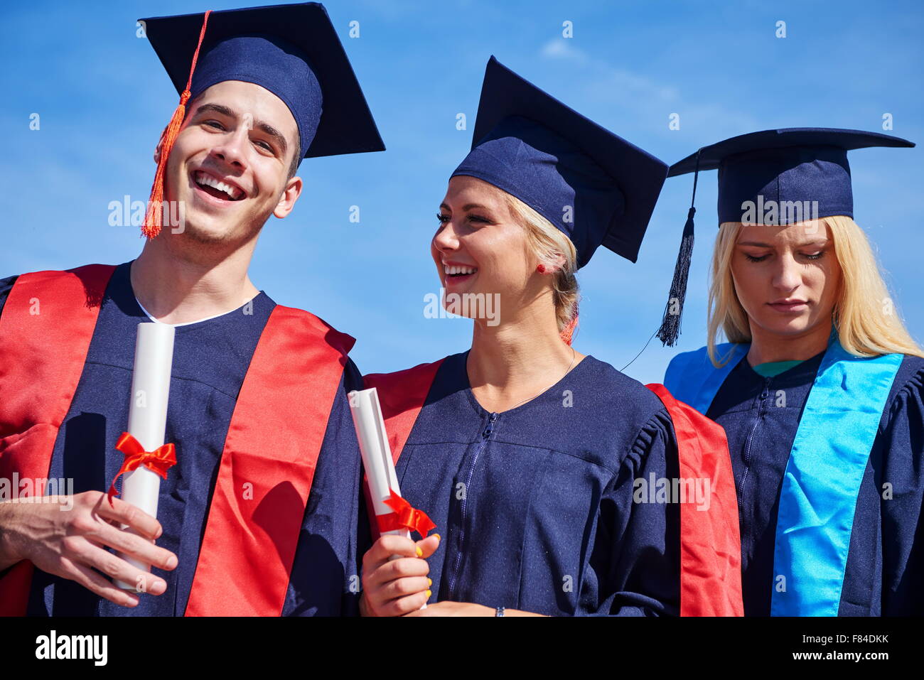 young graduates students group standing in front of university building ...