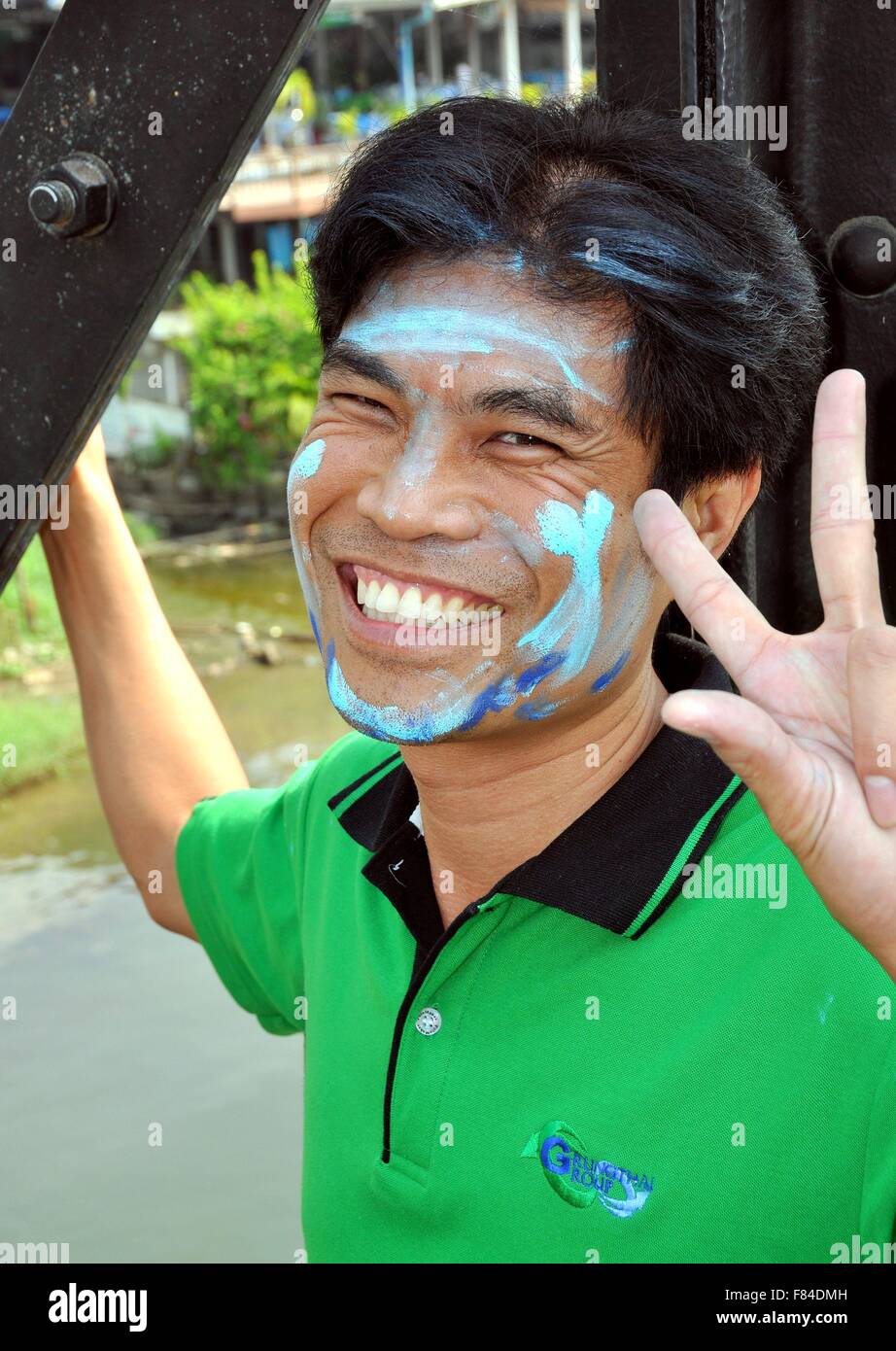 Kanchanaburi, Thailand : Exuberant Thai man with face paint posing on ...