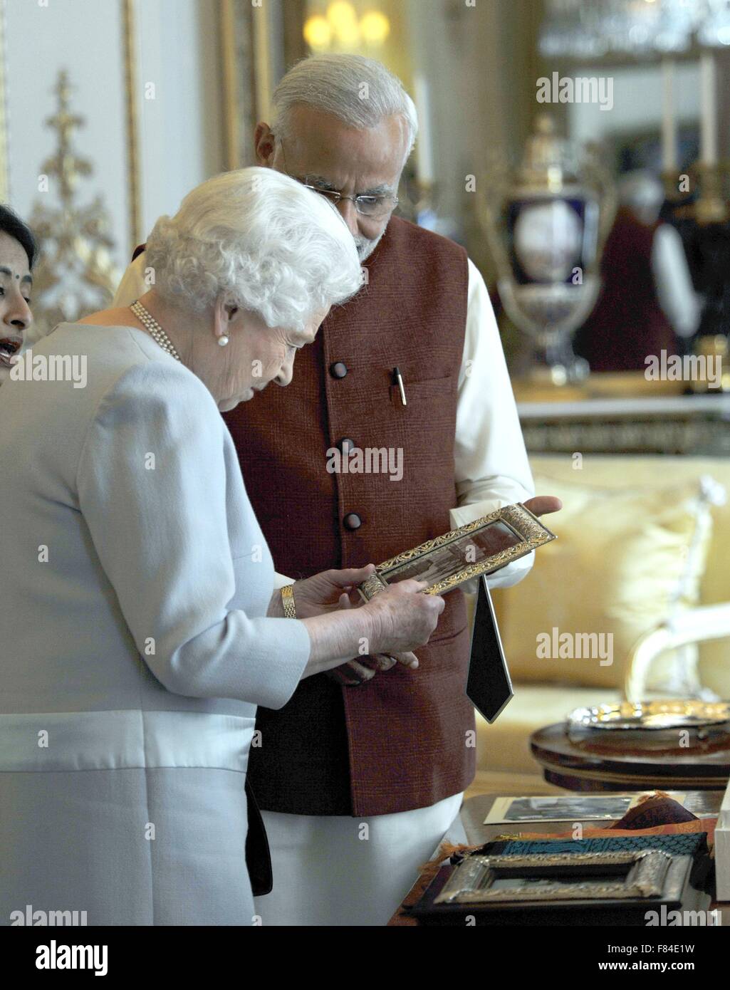 Indian Prime Minister Narendra Modi presents a gift to Her Majesty the ...