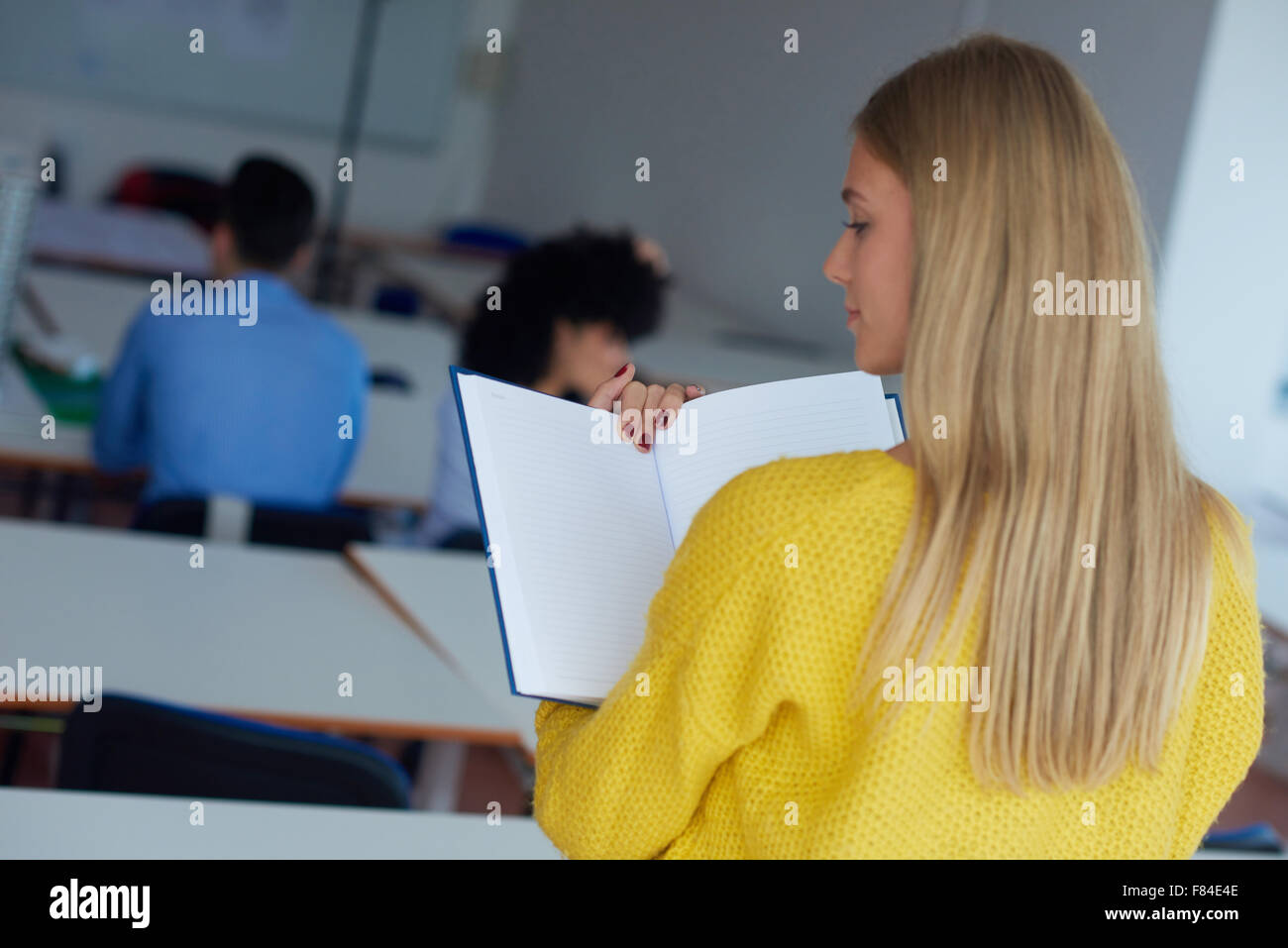 portrait of young female student at school classroom Stock Photo - Alamy