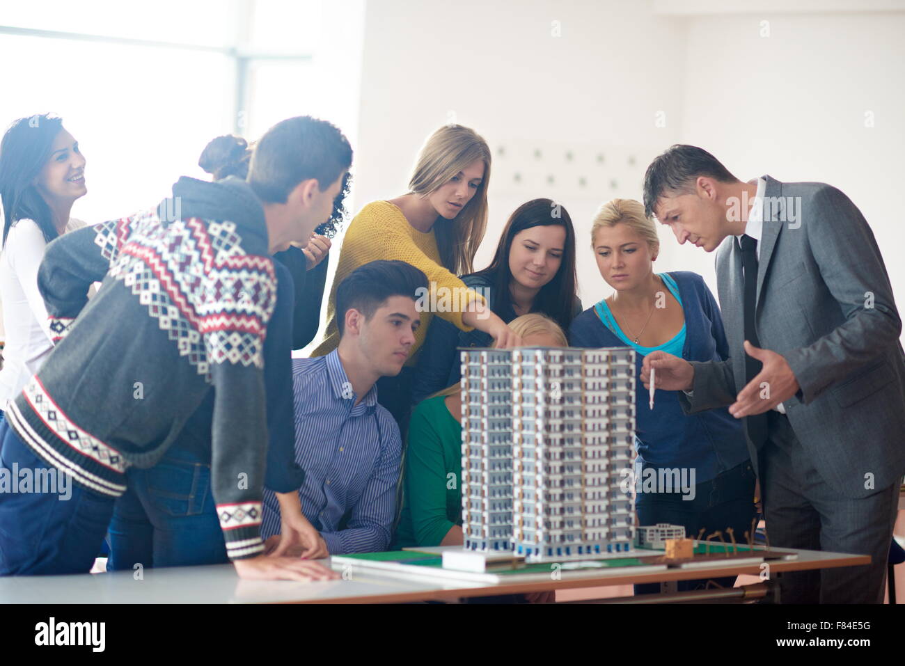 group of students with teacher on class learning lessons Stock Photo ...