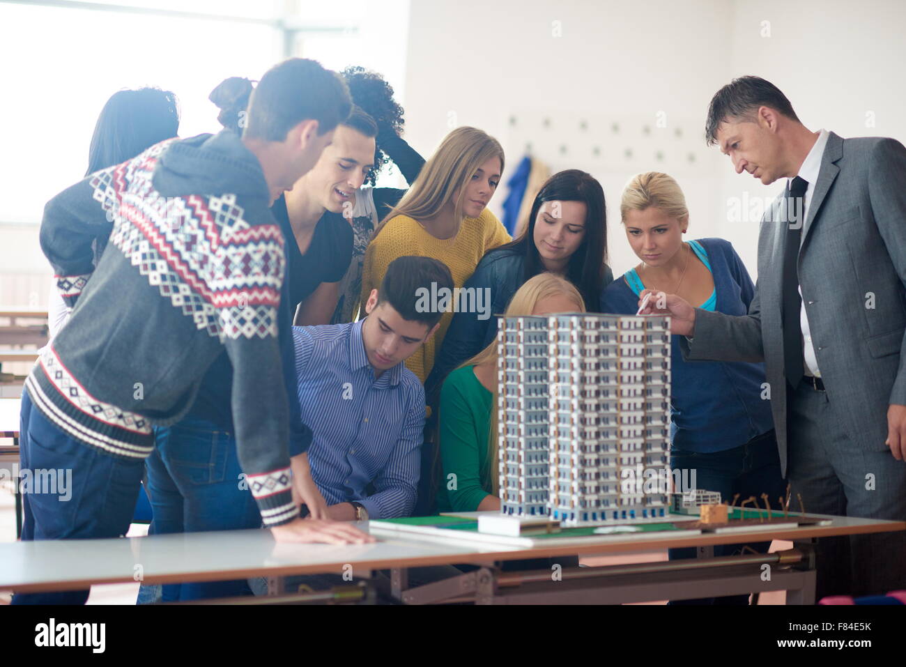 group of students with teacher on class learning lessons Stock Photo ...