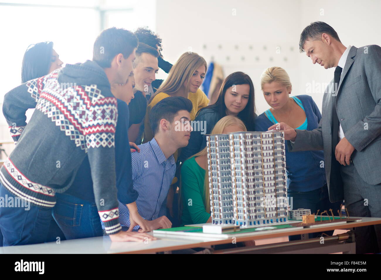 group of students with teacher on class learning lessons Stock Photo ...