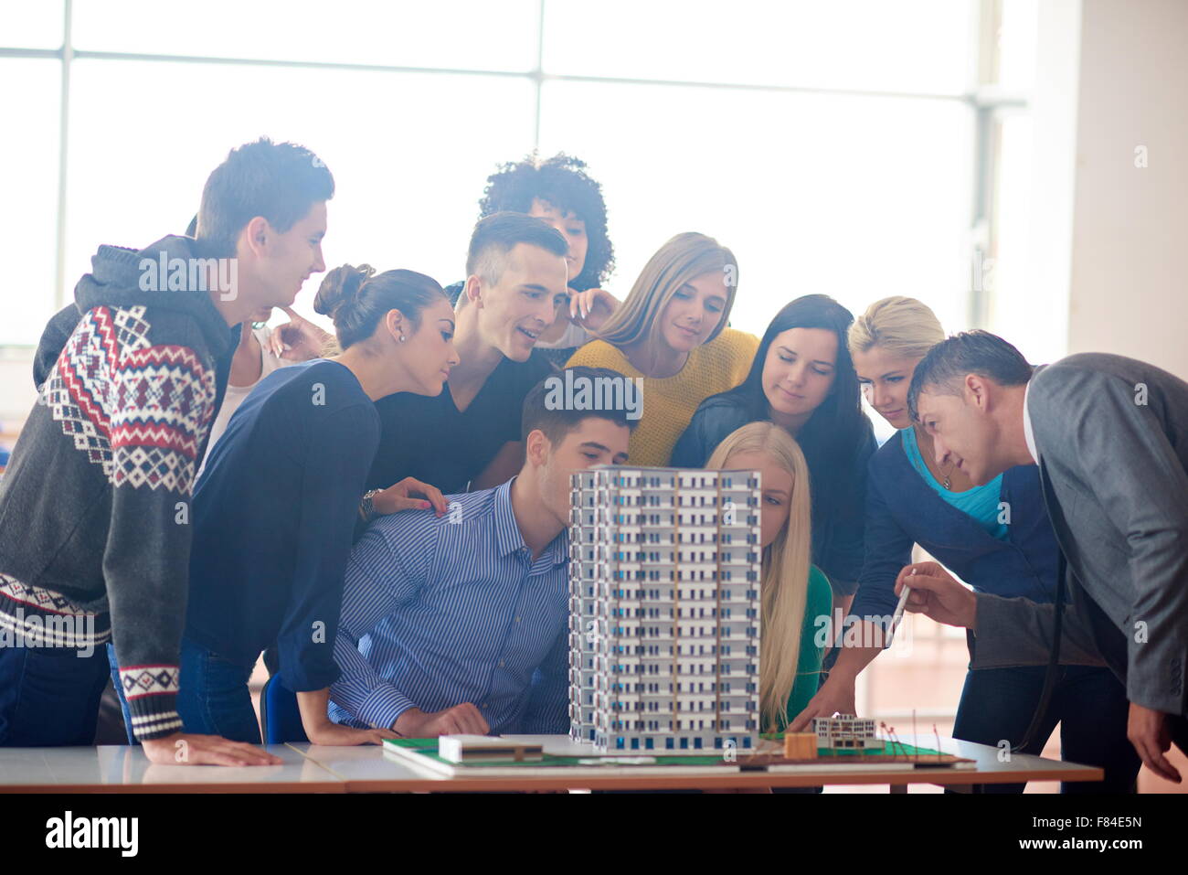 group of students with teacher on class learning lessons Stock Photo ...