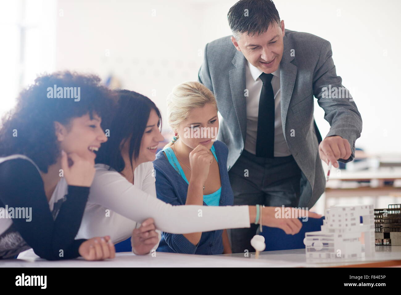 group of students with teacher on class learning lessons Stock Photo ...