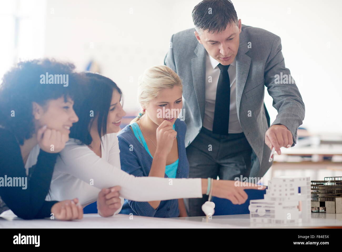 group of students with teacher on class learning lessons Stock Photo ...