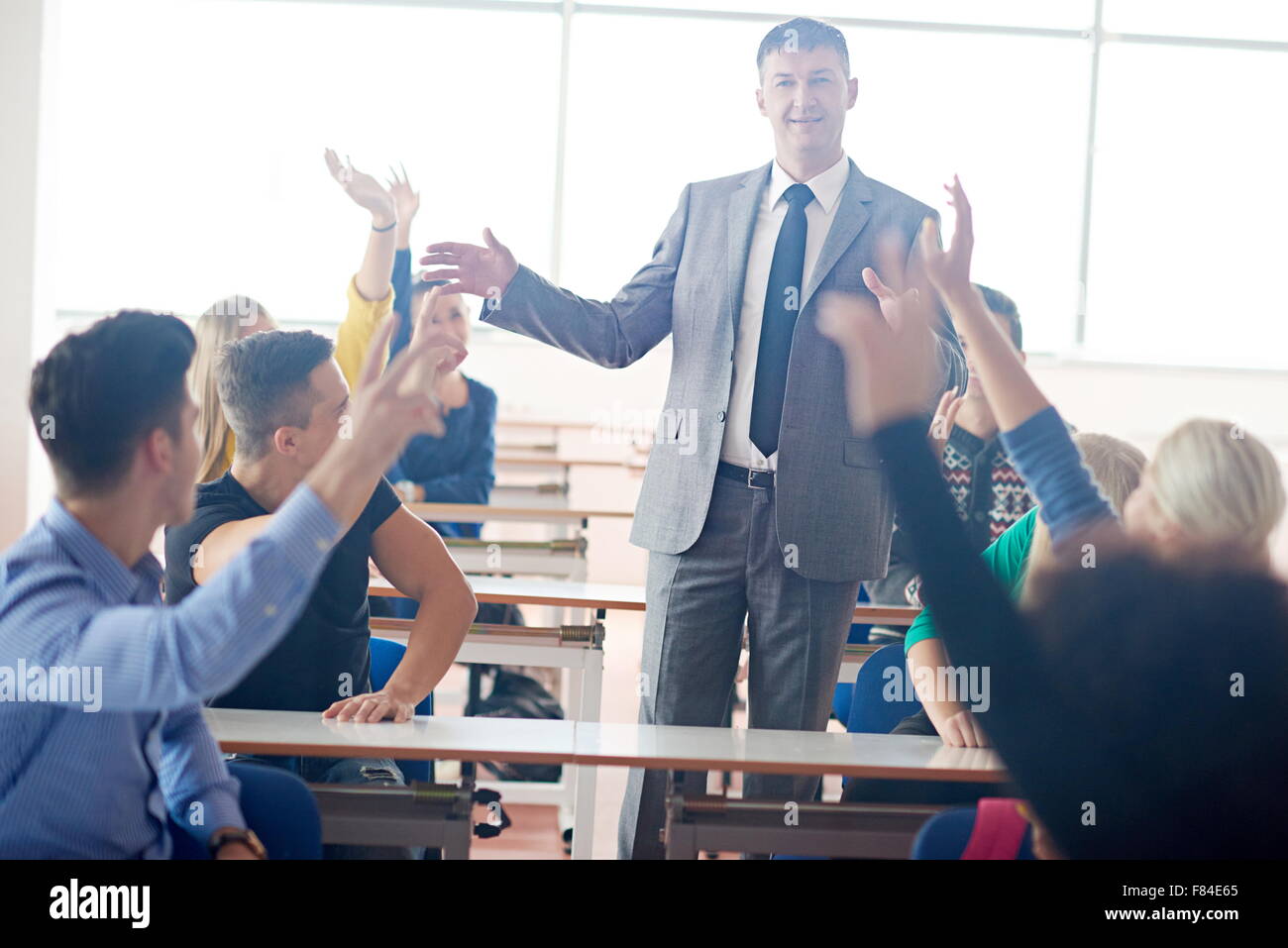 group of students with teacher on class learning lessons Stock Photo ...