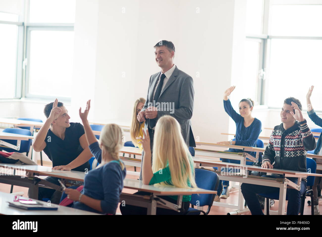 group of students with teacher on class learning lessons Stock Photo ...