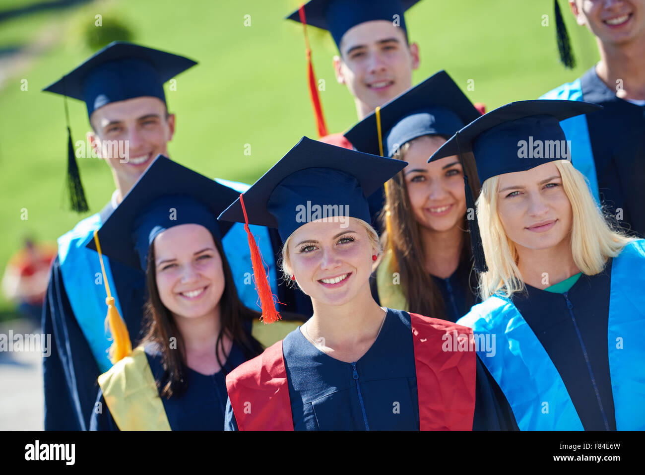 young graduates students group standing in front of university building ...