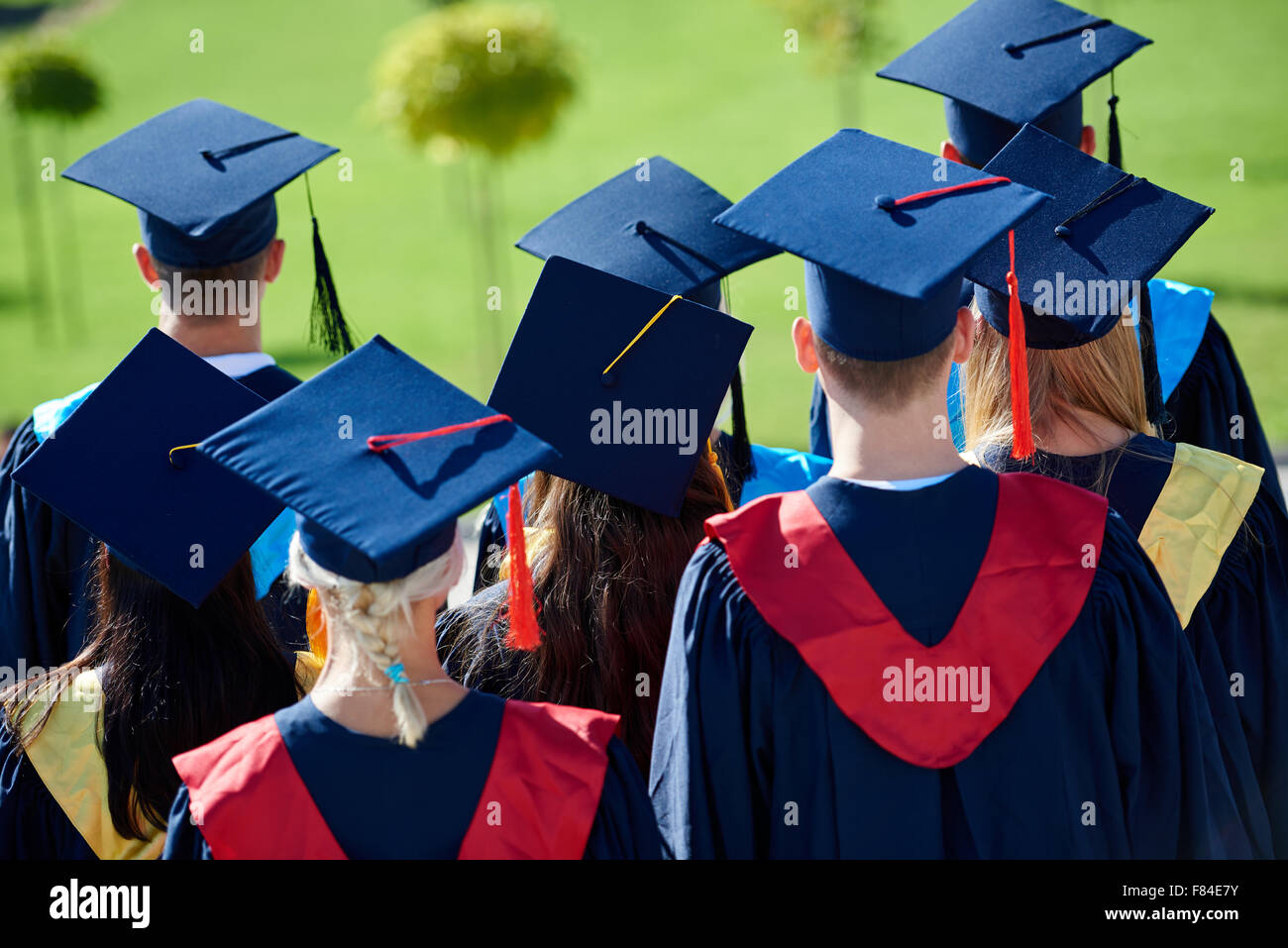 young graduates students group standing in front of university building ...