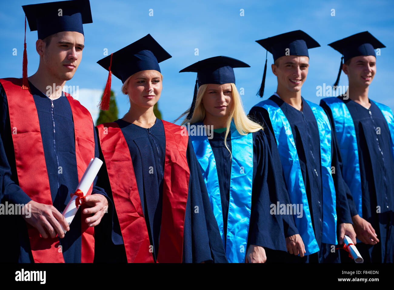 young graduates students group standing in front of university building ...