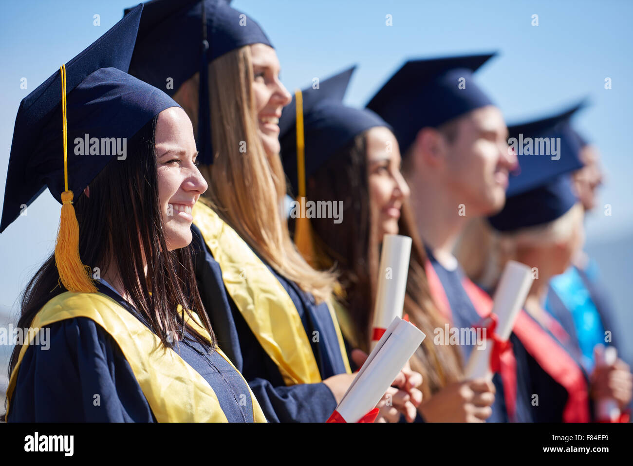 young graduates students group standing in front of university building ...
