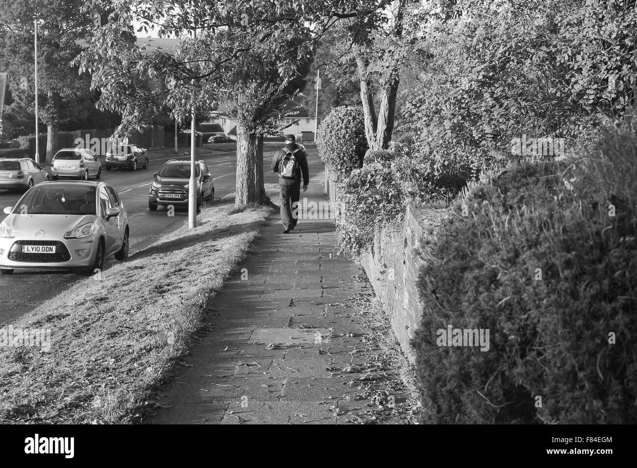 single man walking home Stock Photo - Alamy