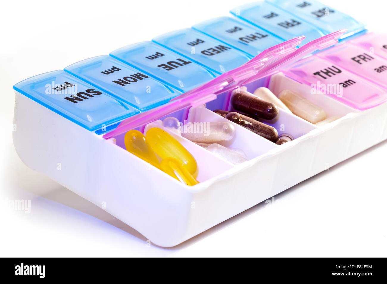 Plastic box with small separations for each day of the week (for ...