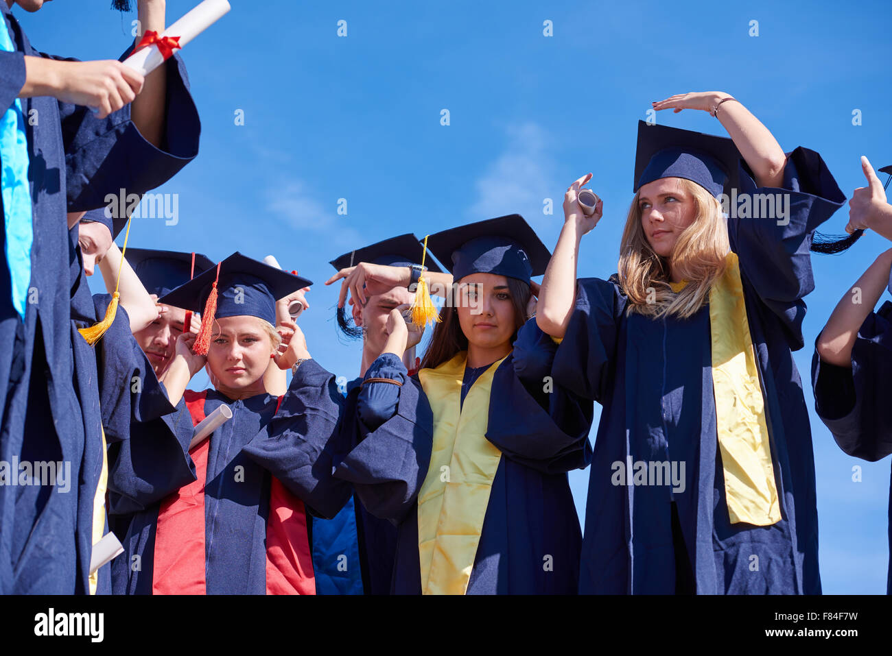 young graduates students group standing in front of university building ...