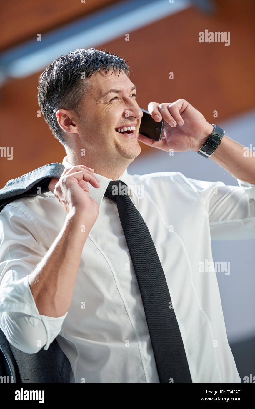 business man using phone at modern office space Stock Photo - Alamy