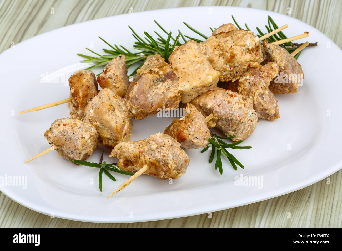 Chicken skewers with rosemary on the wwod background Stock Photo - Alamy
