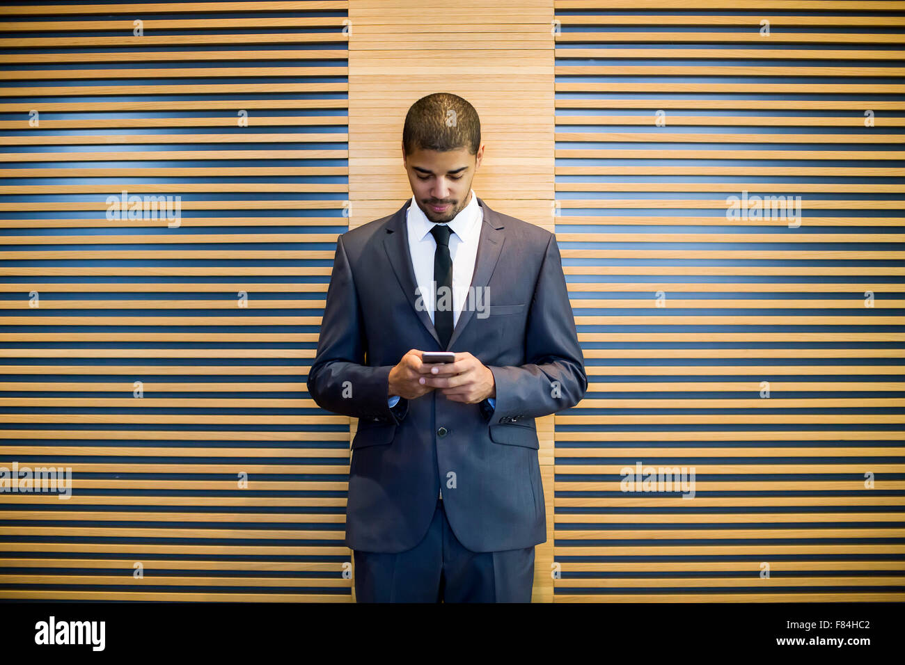 Handsome black businessman Stock Photo - Alamy
