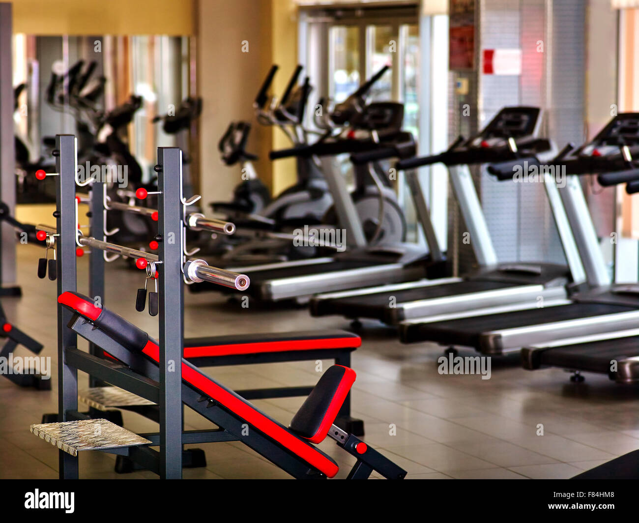 Gym interior with treadmill equipment Stock Photo - Alamy