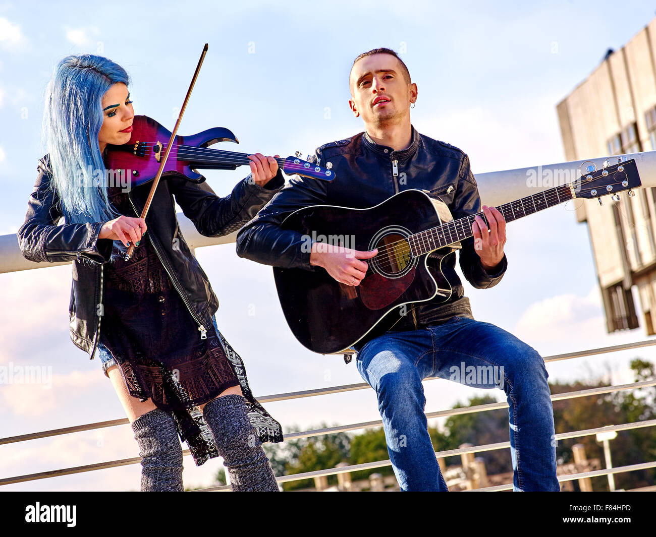 Music street performers with girl violinist Stock Photo - Alamy
