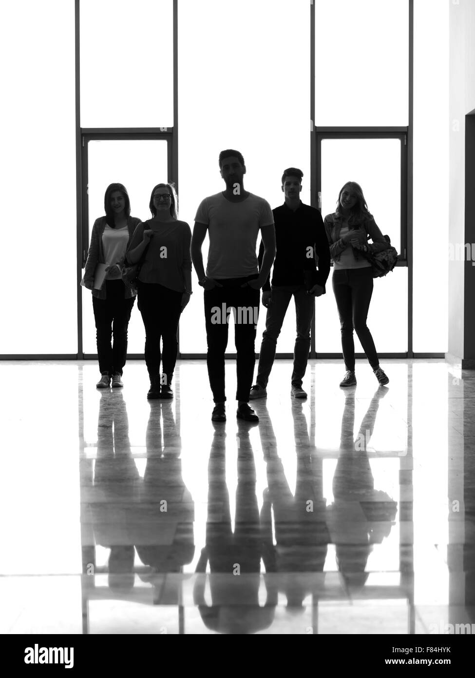 students group standing together as team in modern school university ...