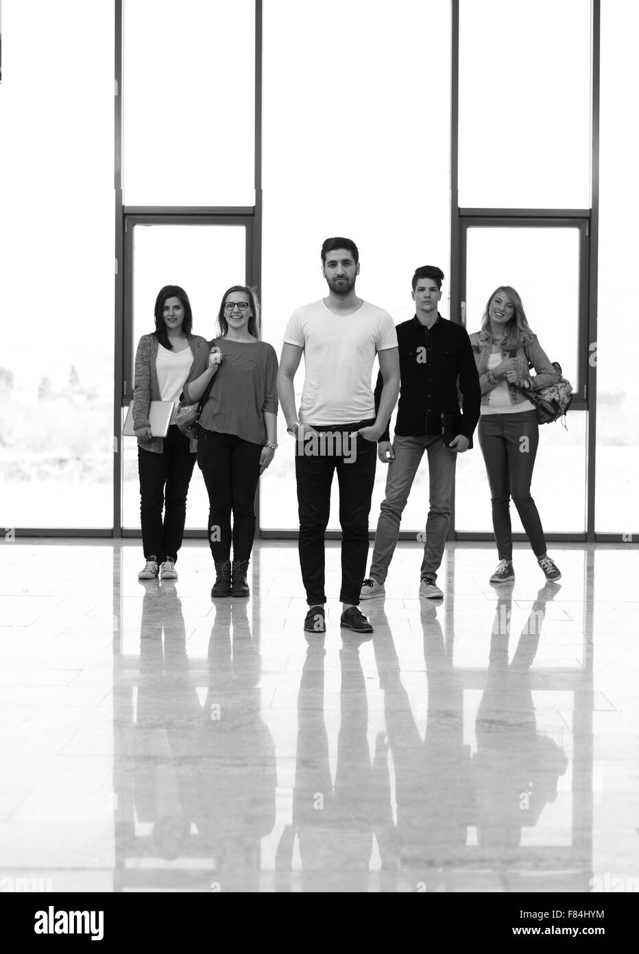 students group standing together as team in modern school university ...