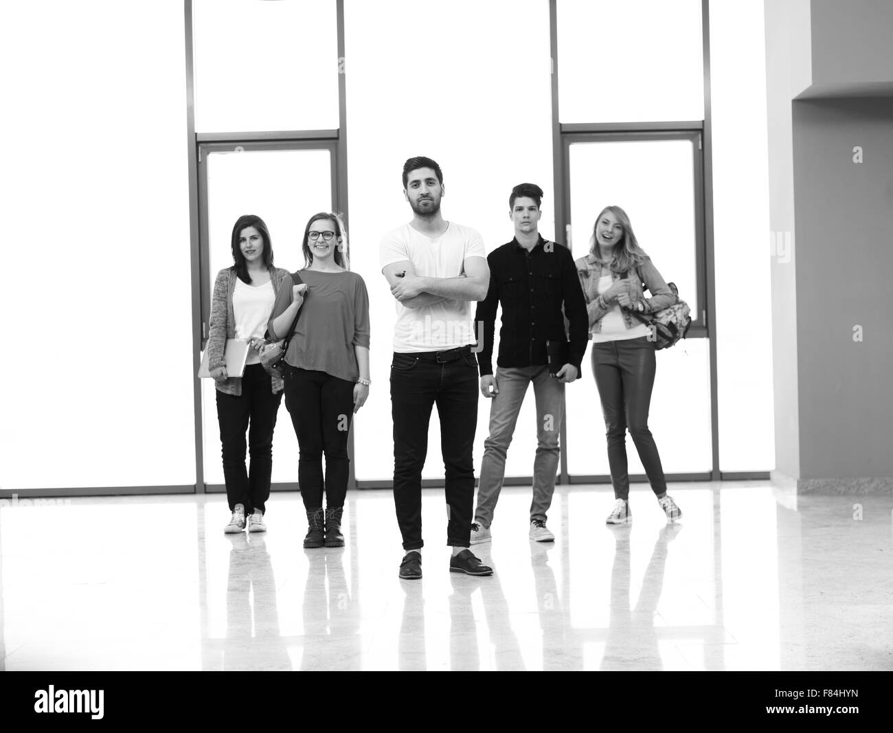 students group standing together as team in modern school university ...