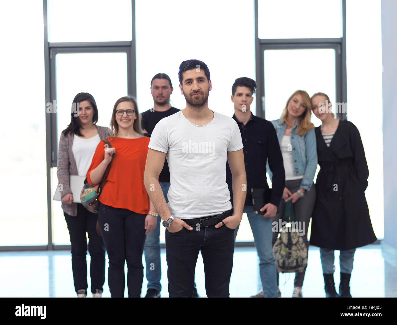 students group standing together as team in modern school university ...