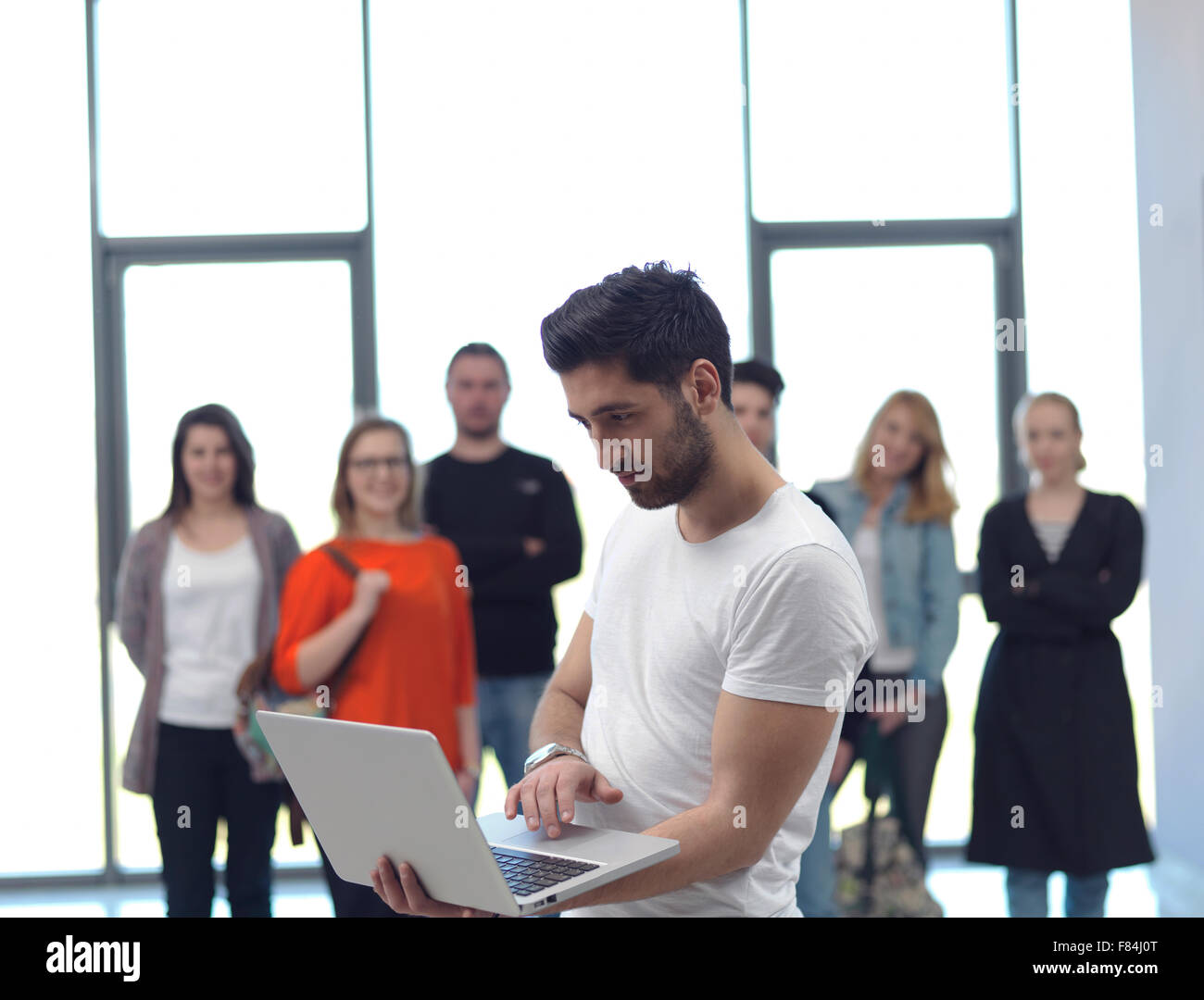 students group standing together as team in modern school university ...