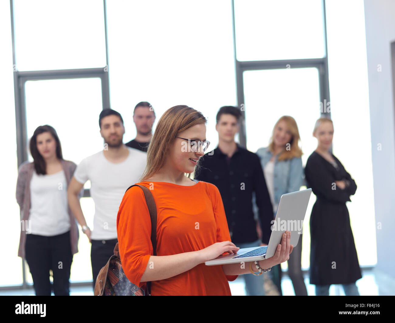 students group standing together as team in modern school university ...