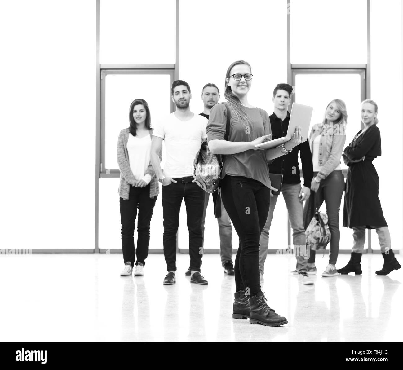 students group standing together as team in modern school university ...