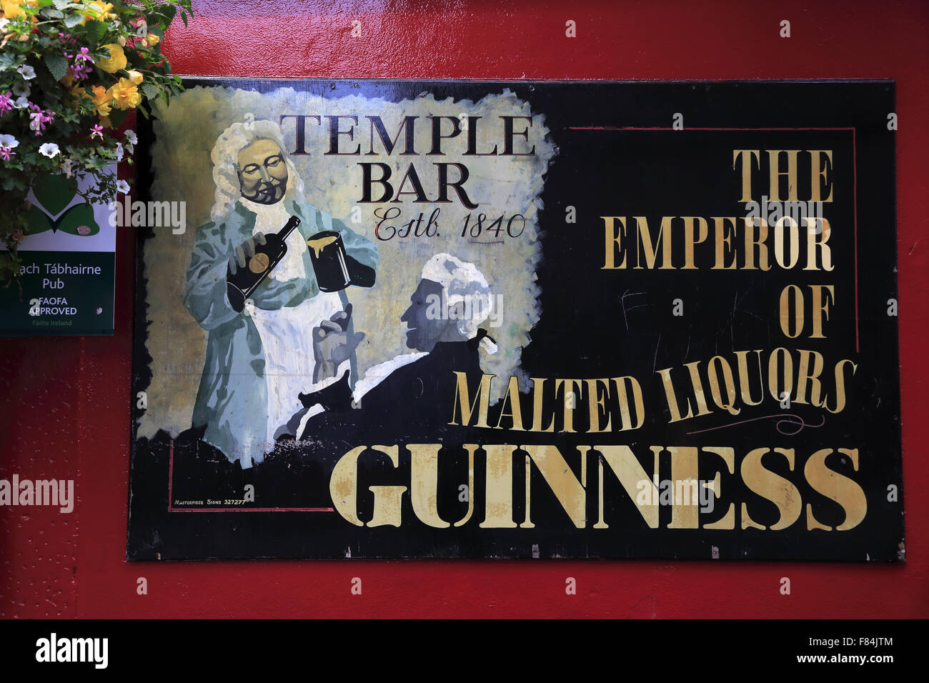 Guinness beer advertising on the wall of Temple Bar pub in Temple Bar ...