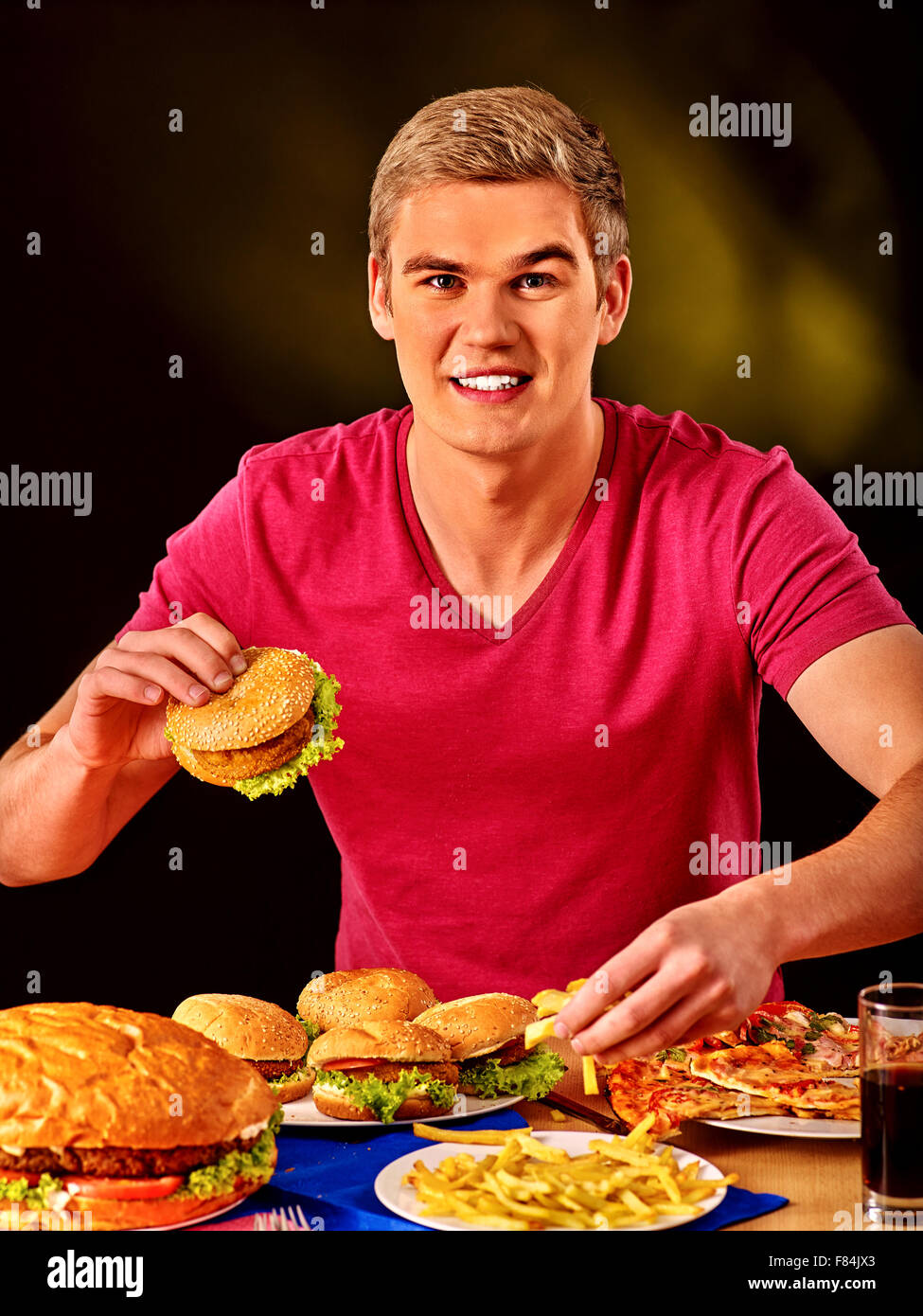 Man eating big sandwich Stock Photo - Alamy