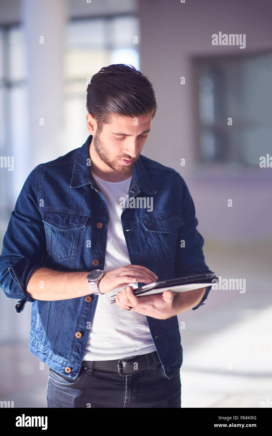 student using tablet computer for education in school, university ...