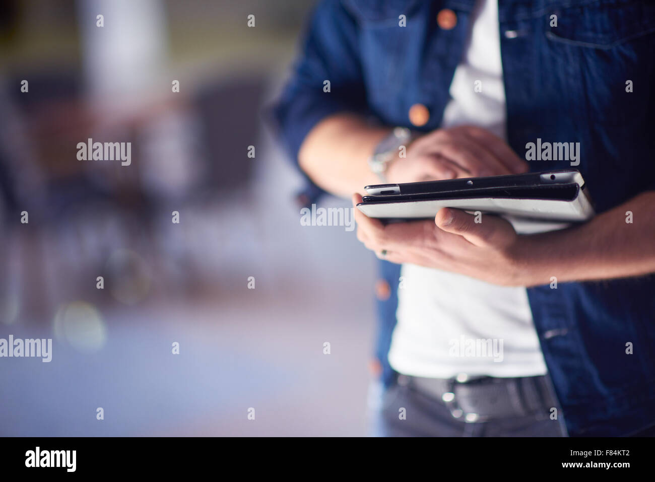 student using tablet computer for education in school, university ...