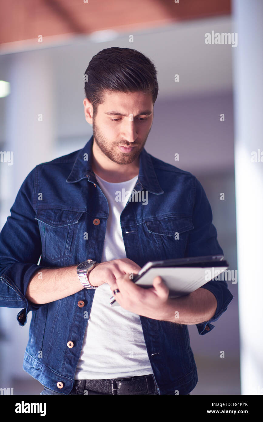 student using tablet computer for education in school, university ...