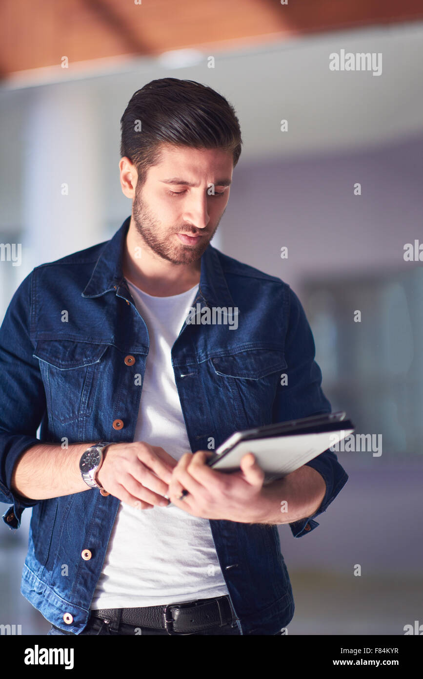 student using tablet computer for education in school, university ...