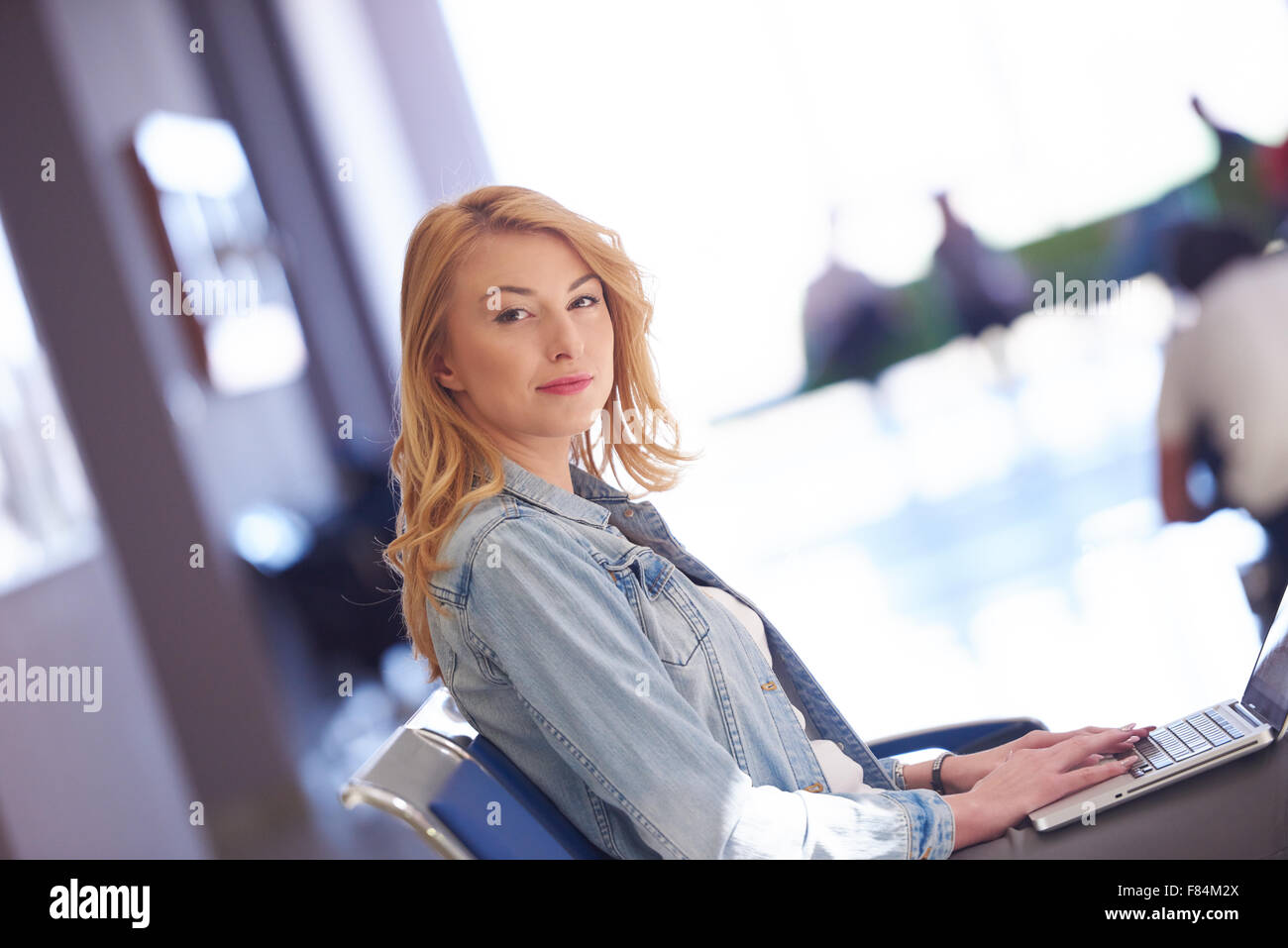 happy student girl working on laptop computer at modern school ...