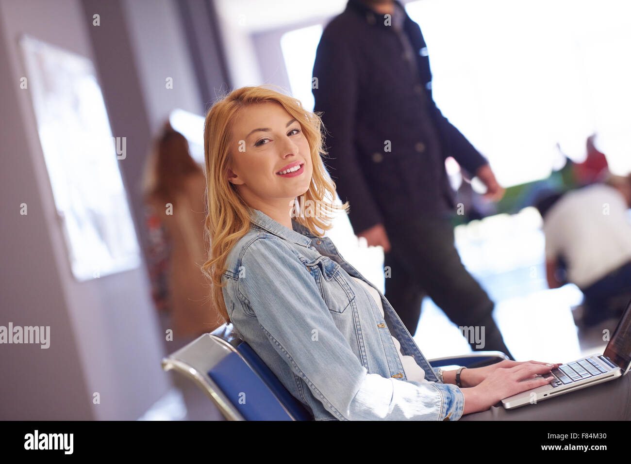 happy student girl working on laptop computer at modern school ...