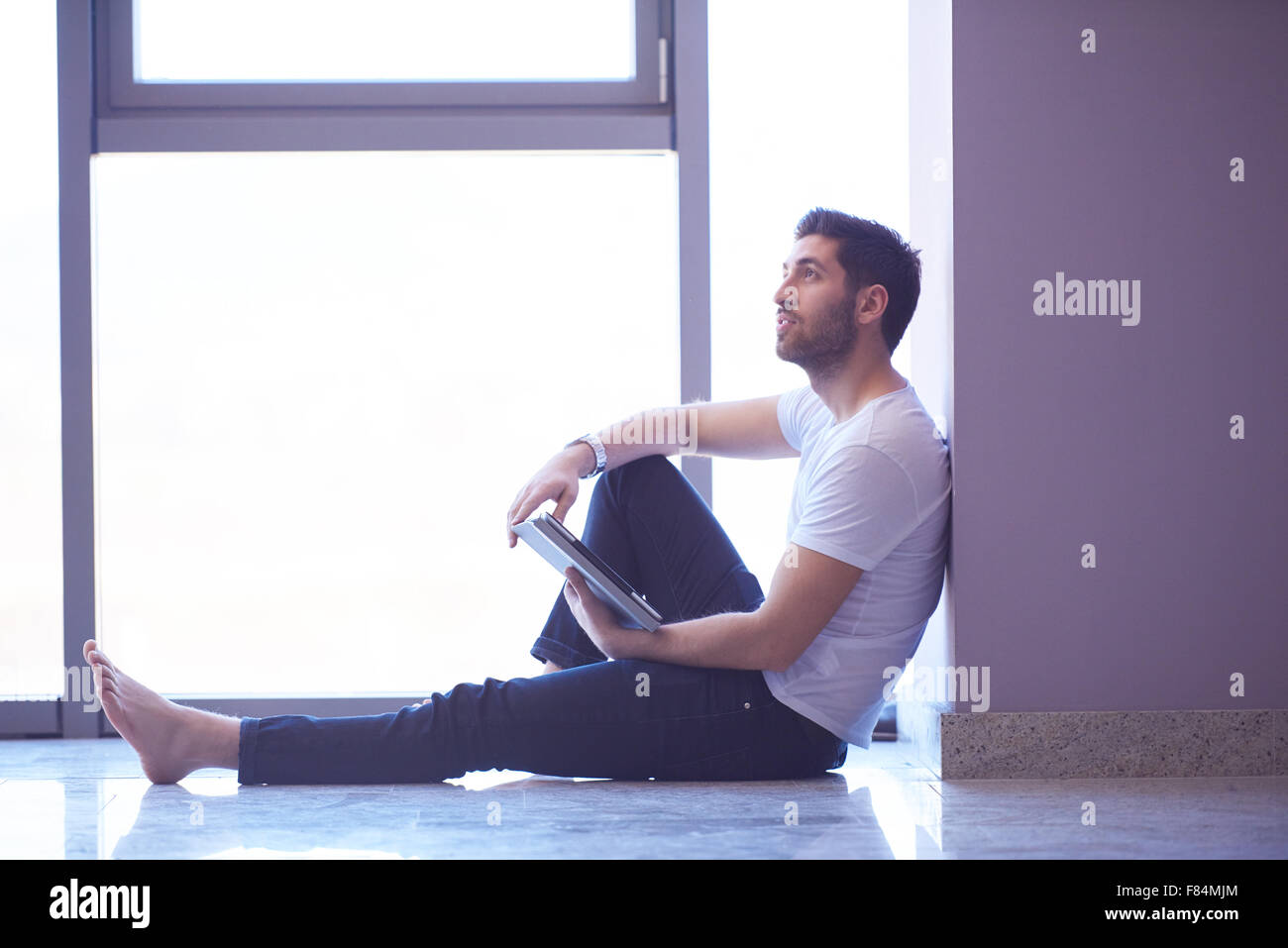 student working on tablet computer at university school modern interior ...