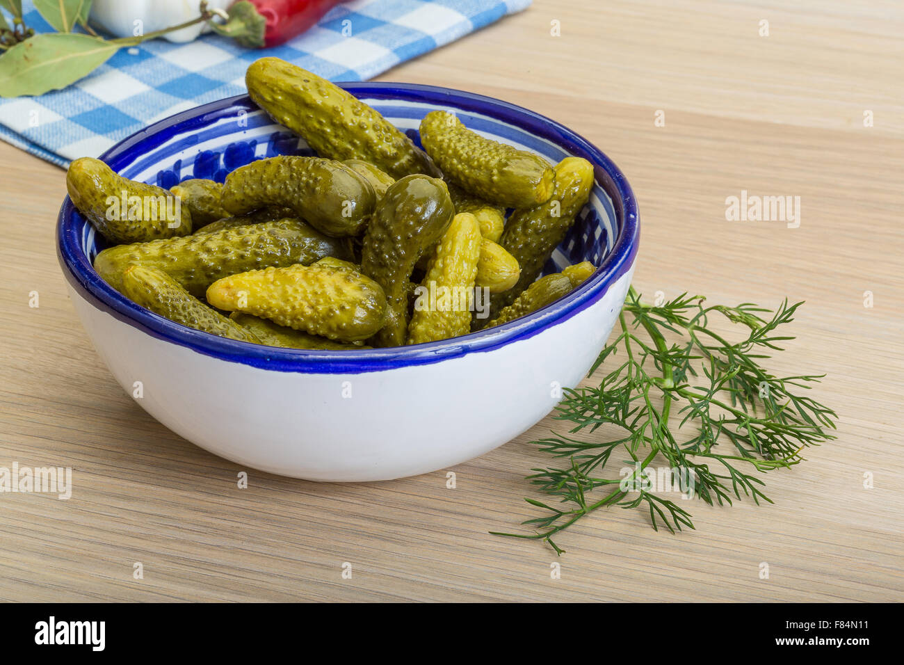 Pickled small cucumber with dill and spices Stock Photo - Alamy