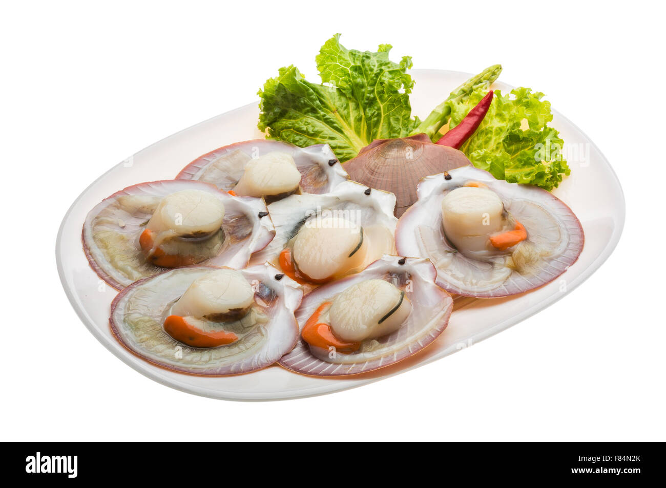 Raw fresh scallop ready for cooking Stock Photo - Alamy