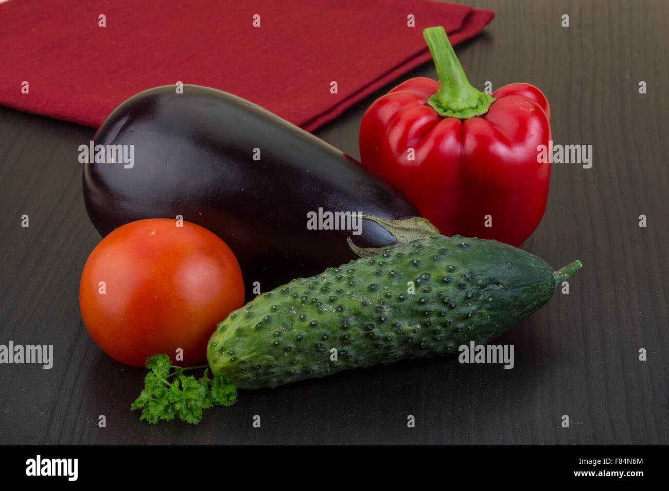 Vegetable assortment: tomato, cucumber, pepper, aubergine Stock Photo ...